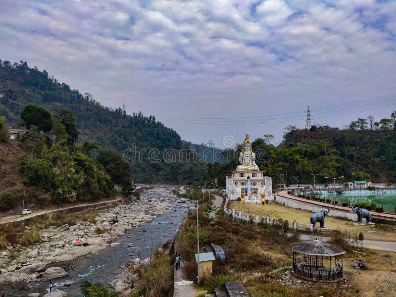 Riverside Hindu Temple in Mountain. Stock Photo - Image of river, green ...