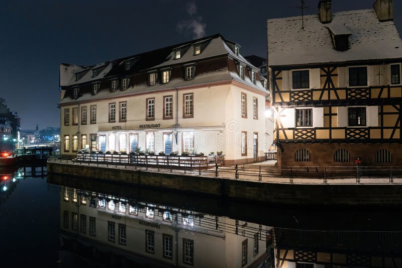 Riverside Hotel and Restaurant at Night Stock Photo - Image of ...
