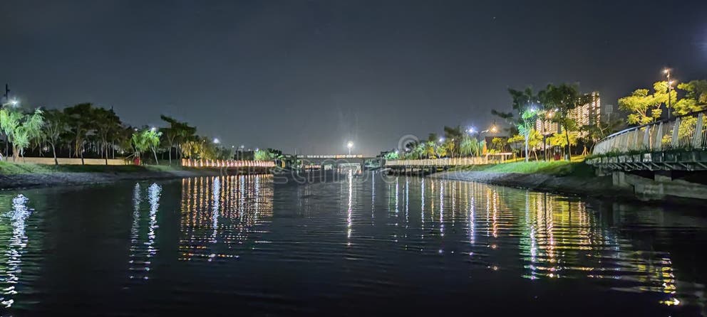 Riverside night view stock photo. Image of night, outdoor - 261865522