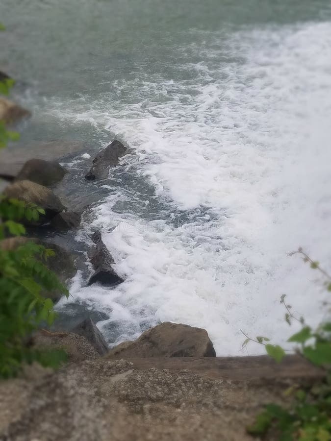 RiverSide stock image. Image of water, rocks, leaves - 152139747