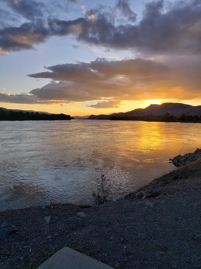 Riverside sunset bikride stock photo. Image of blue - 226419508