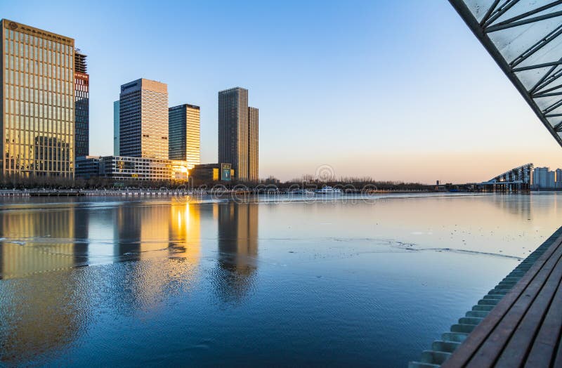 Riverside Towers in the Evening Stock Image - Image of blue, skyline ...