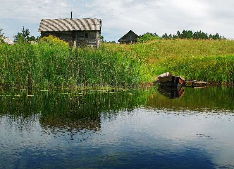 Riverside village stock photo. Image of bushes, minute - 4068530