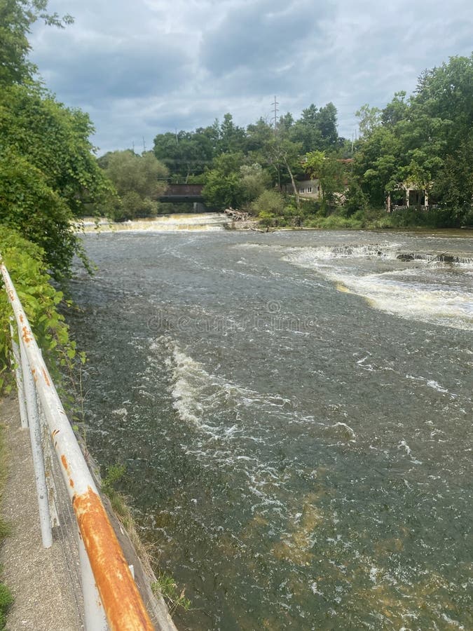 Riverside, Waterfall with Rusted Railing Stock Photo - Image of falls ...