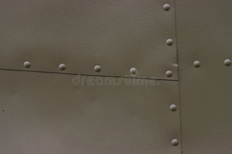 Riveted Metal Plates, Painted and Weathered Green. Stock Image - Image ...