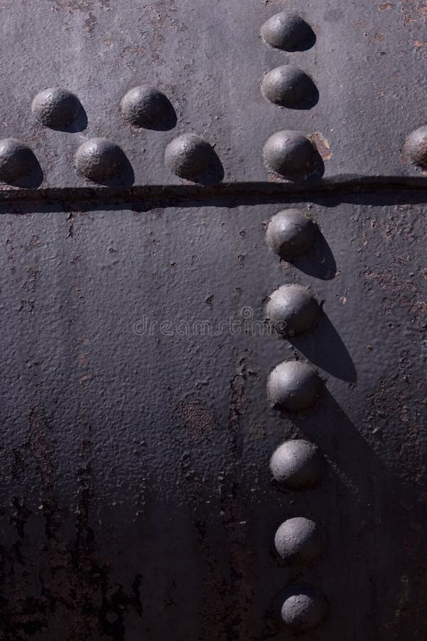 Old Rivets on Black Metal Plate Grunge Background Stock Image - Image ...