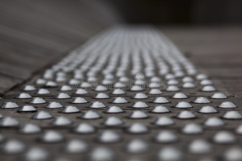 Rivets in wood deck stock photo. Image of rivets, grain - 256022610