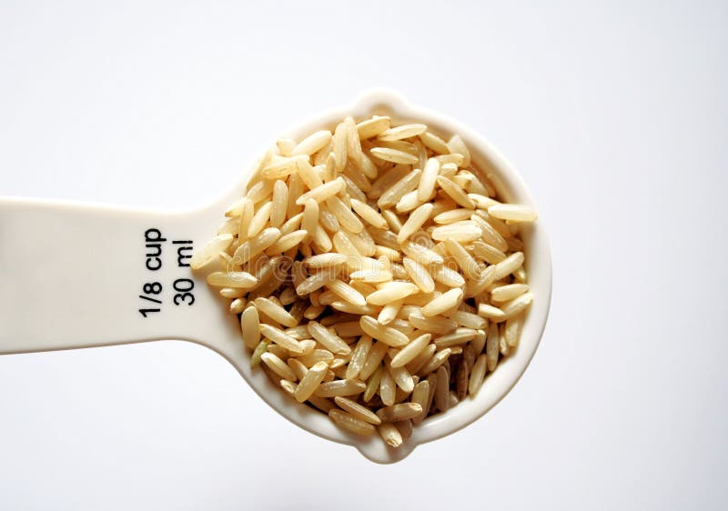 Riz brun entier photo stock. Image du texture, ingrédient - 26184208