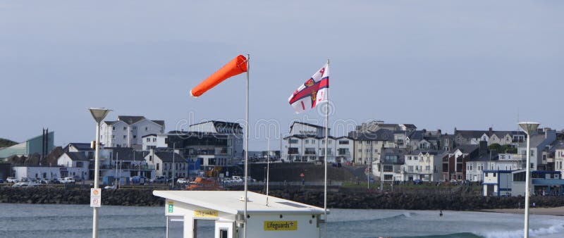 RNLI Flag and Orange Windsock and Beach Warning Flags Indicating Sea ...