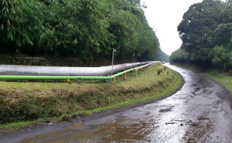 Road stock image. Image of pipe, road, trees, green - 135094471