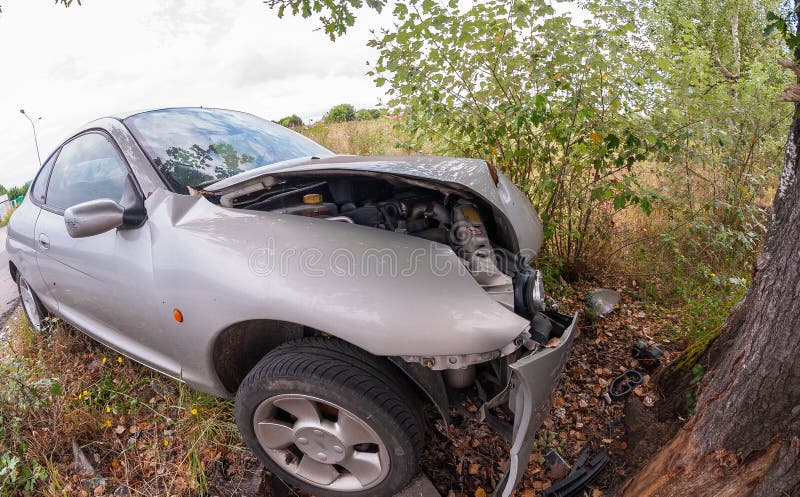 Broken Car After An Accident Against A Tree Stock Photo - Image of ...