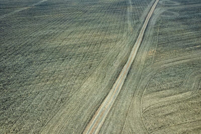Road in Agricultural Field, Plowed Field in Early Spring Stock Photo ...