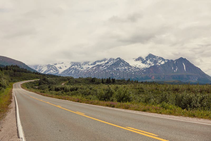 Road in Alaska stock image. Image of outback, forest - 218901769