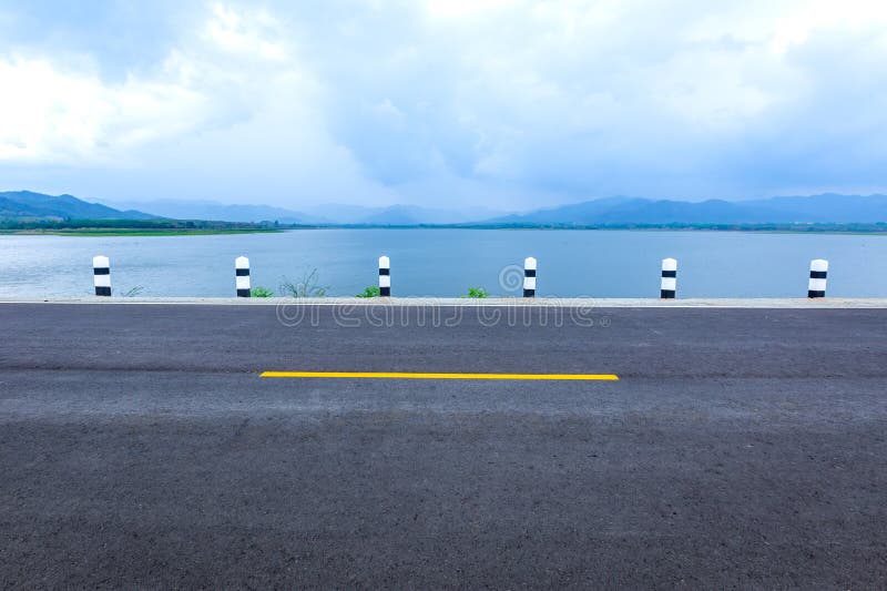 Road Along the Lake Water. Asphalt Road. Road on the Dam Stock Image ...