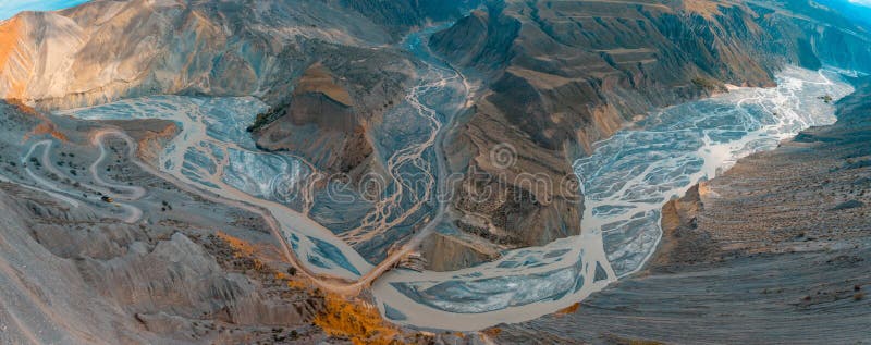 Road Along the River Going through Mountains and Cliffs, Aerial Stock ...