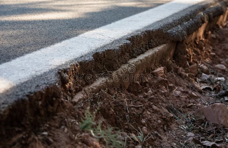 Road in Bad Condition with Crumpling Roadside Stock Photo - Image of ...
