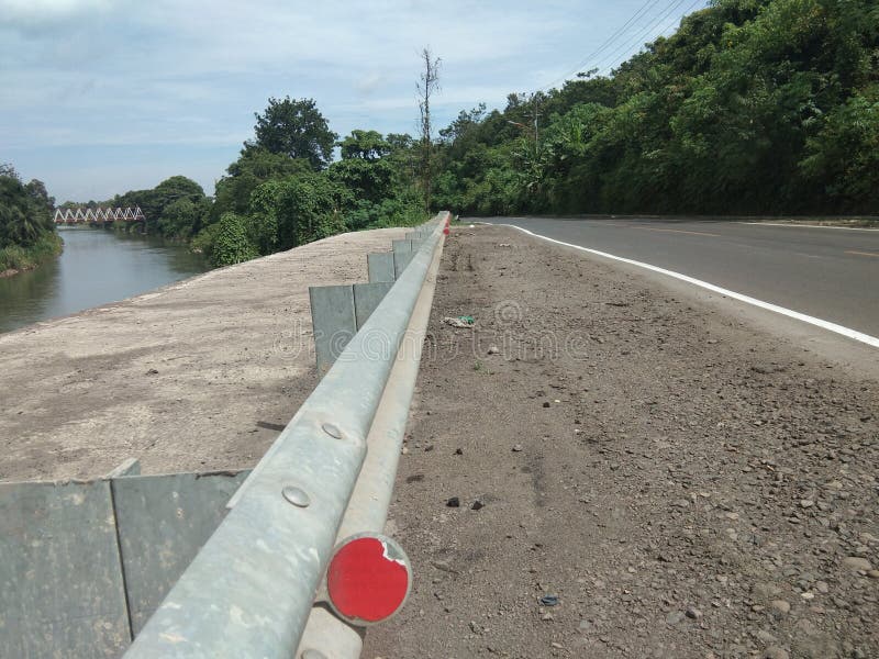 Road Barrier and the Beauty of a River Stock Photo - Image of barrier ...