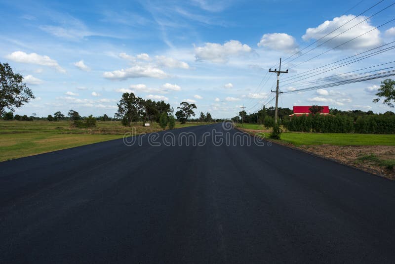 The Road Being Built in the Atmosphere of Blue Sky and White Stock ...