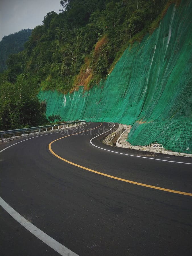 The Road Bends at the Edge of the Cliff Stock Image - Image of street ...
