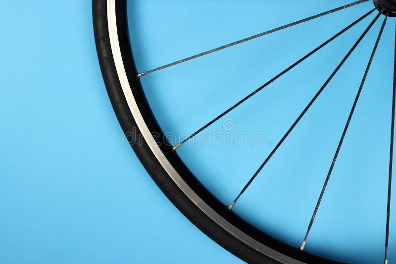 Road Bike Wheel on a Blue Background Stock Photo - Image of profile ...
