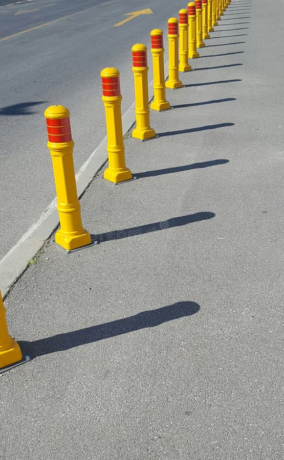 Road Block Pole in Straight Line Stock Photo - Image of barrier ...