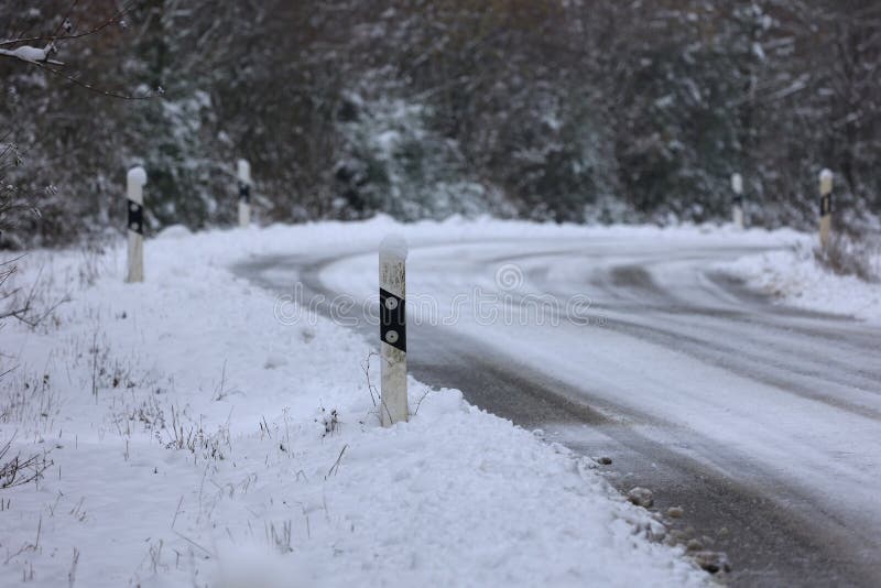 Road Bollard at a Turn in Bad Weather Stock Photo - Image of wind ...