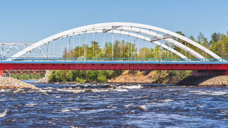 Road Bridge Over a Fast Bubbling River in Natural Light. Stock Image ...