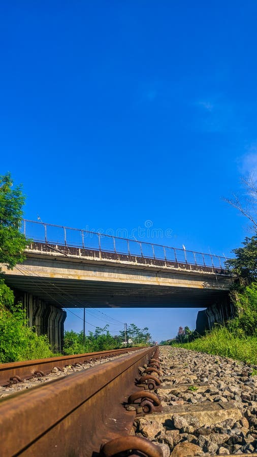 Road Bridge Over the Railroad Tracks Stock Photo - Image of bridge ...