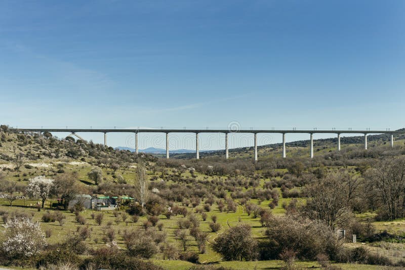 A Road Bridge Over a Valley with Sparse Vegetation Stock Photo - Image ...