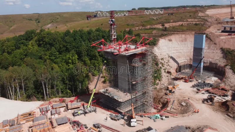 Construction Crane by Road Bridge Support at Building Site Stock ...