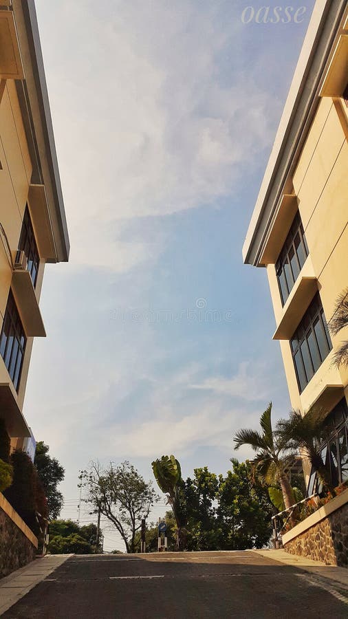 Road between 2 Buildings Opposite Stock Image - Image of road, street ...