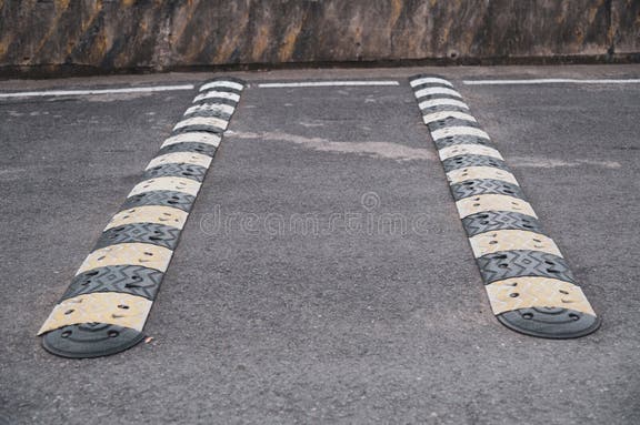 Road bumps stock image. Image of sign, yellow, bumpy - 312868517