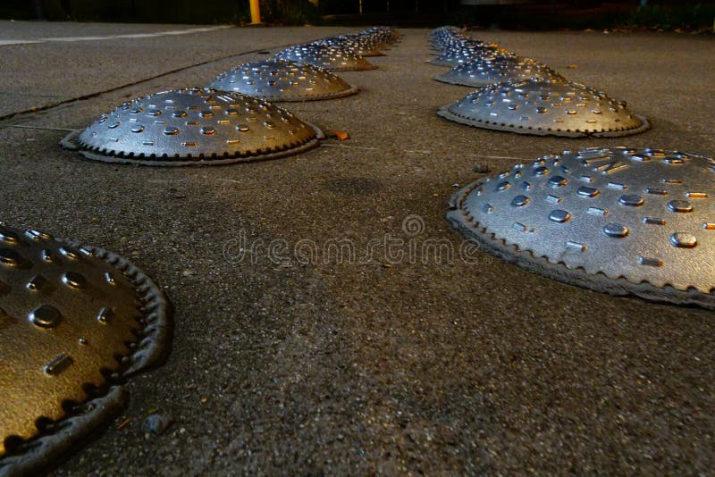 Road Bumps for Reducing the Speed of a Car Stock Image - Image of ...