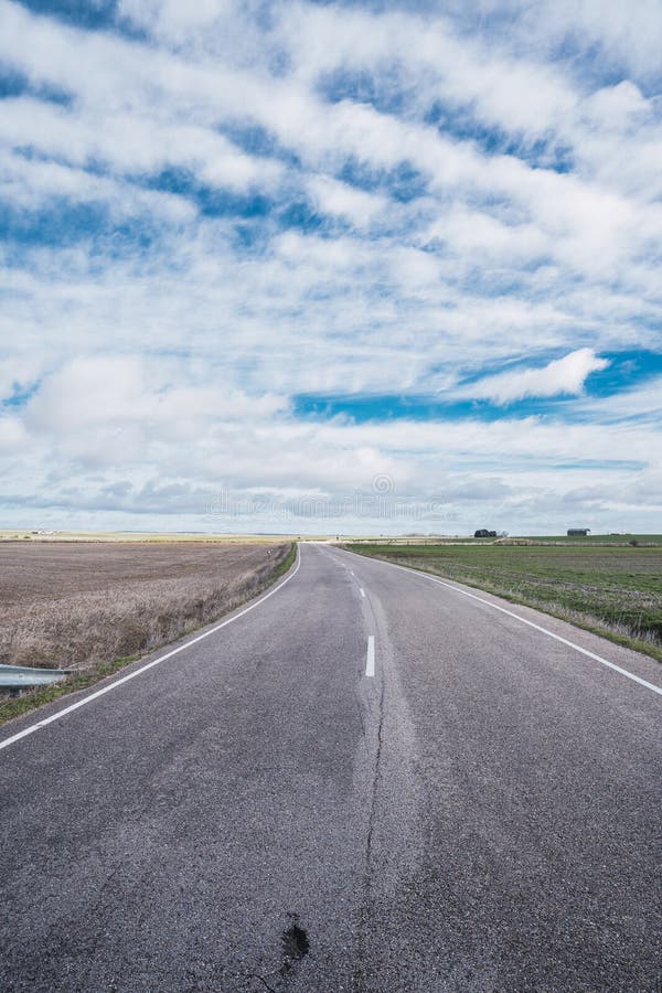 Road with clouds stock image. Image of landscape, street - 210296239