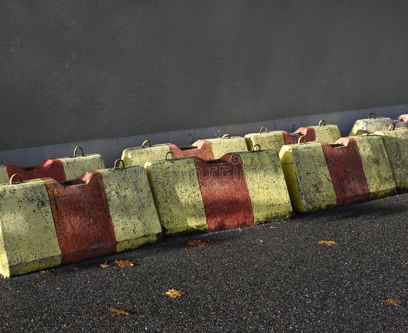 Road Concrete Blocks and Barriers on the Asphalt Stock Image - Image of ...
