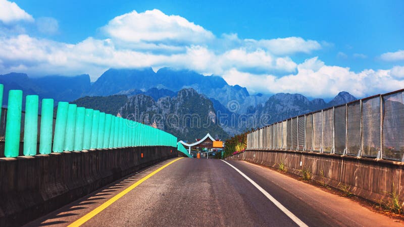 A Road Connecting Cities with Beautiful Overlapping Mountain Views ...