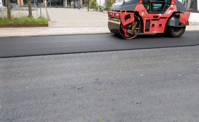 Road Construction Asphalt Roller Machine at Work. Stock Image - Image ...