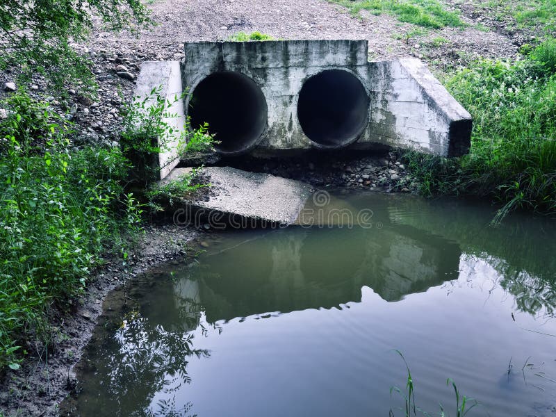 Construction of a Drainage Ditch Along a Road with a Culvert Under the ...