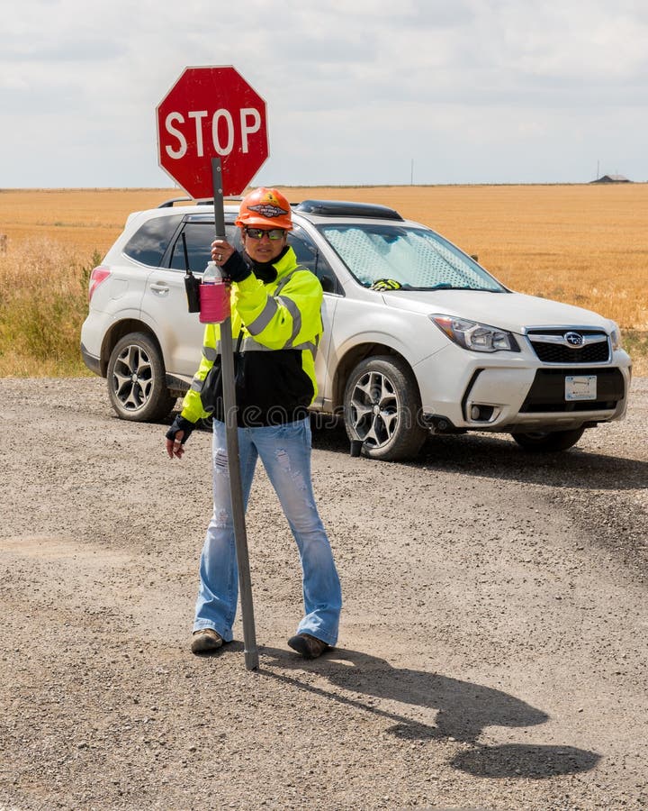 Road construction flagger editorial photo. Image of woman - 58674156