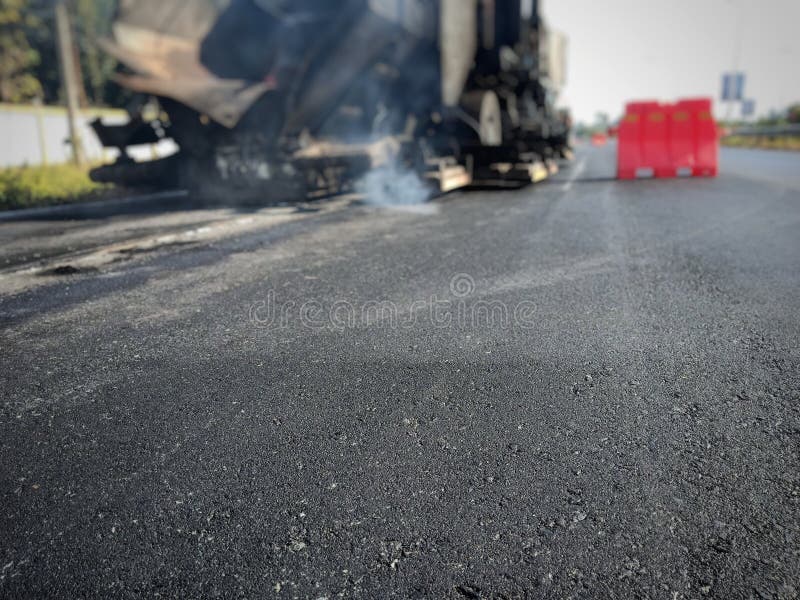 Road Construction with the Method of Burning Asphalt and Mixing ...