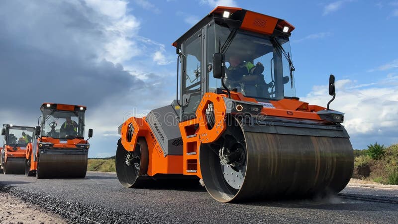 Road Construction Rollers Level and Compact a New Layer of Asphalt ...