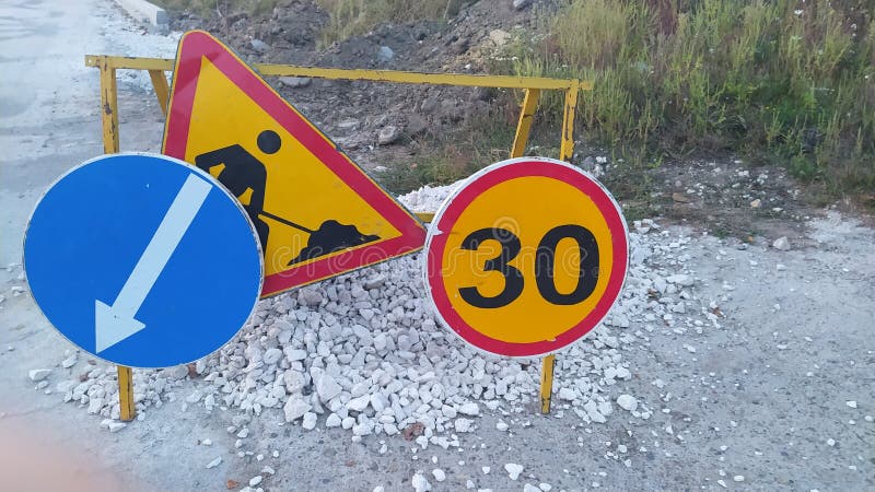 Be Aware of Construction Warning Signs Indicating the Speed Limit in ...