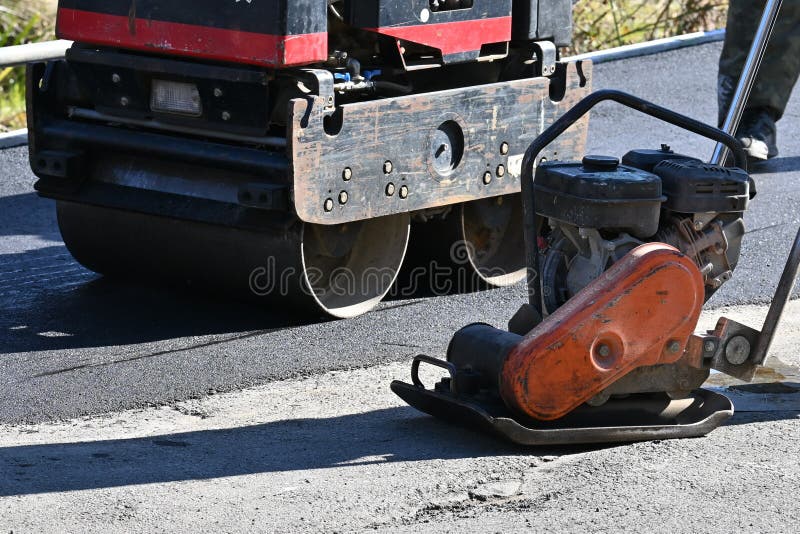The Road Construction Site. Asphalt Paving Work Stock Photo - Image of ...
