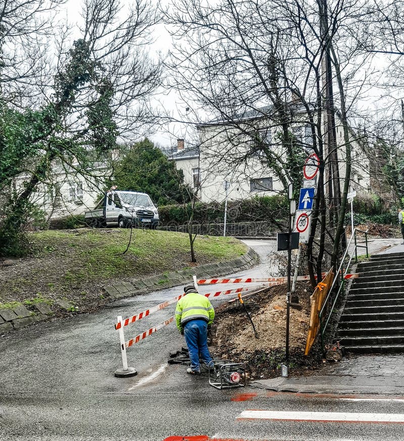 Road Construction Work is Carried Out by a Road Worker Editorial ...