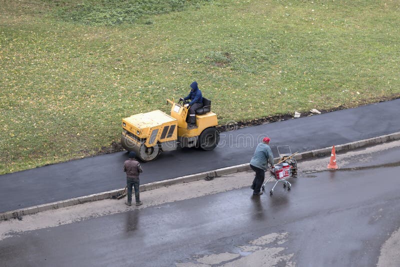 Road Construction Worker Compactes Fresh Asphalt Stock Image - Image of ...
