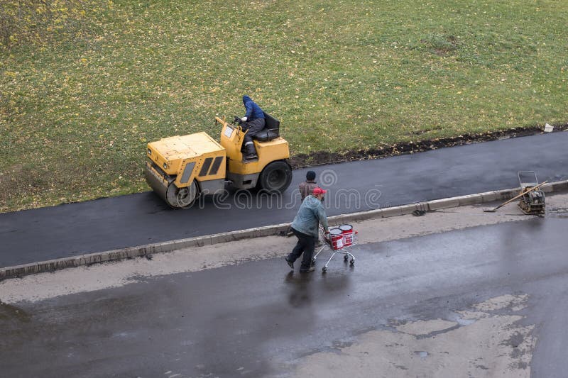 Road Construction Worker Compactes Fresh Asphalt Stock Image - Image of ...