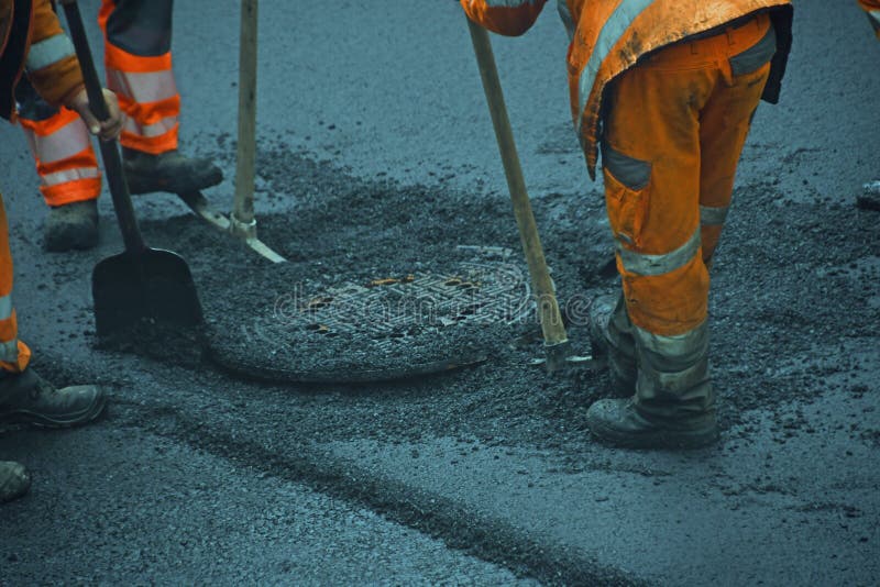 Road Construction Workers Working with Pickaxe Stock Photo - Image of ...