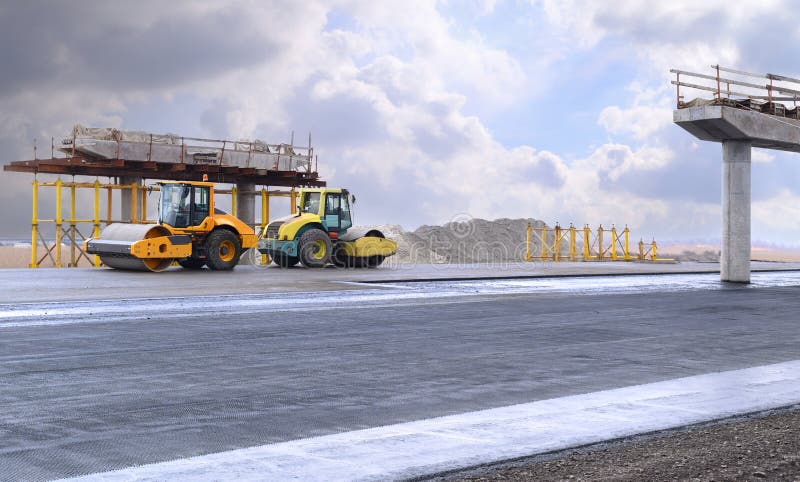 Road Construction with Yellow Road Rollers when Paving Asphalt. Stock ...