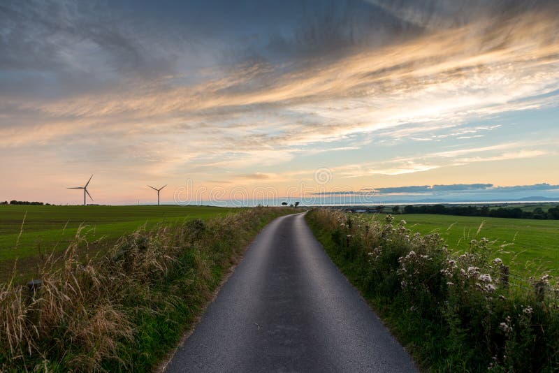 Road through countryside stock photo. Image of field - 62203360