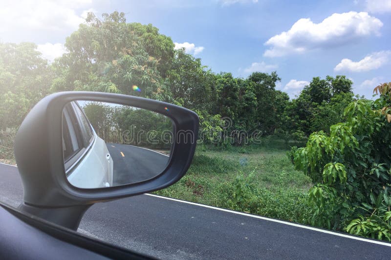 Road Countryside Reflection of Sunny Autumn Road at the Car Side Mirror ...